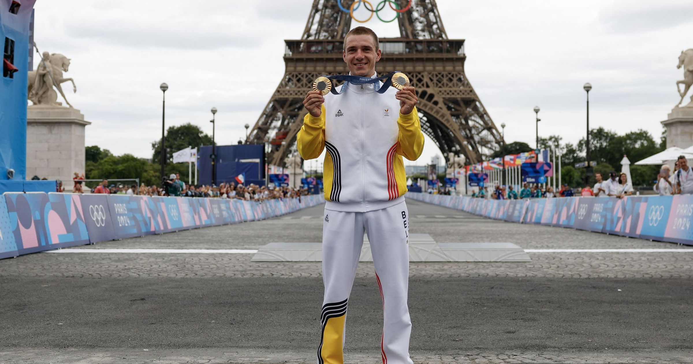 Remco Evenepoel survives late drama to become first man to ever do ...