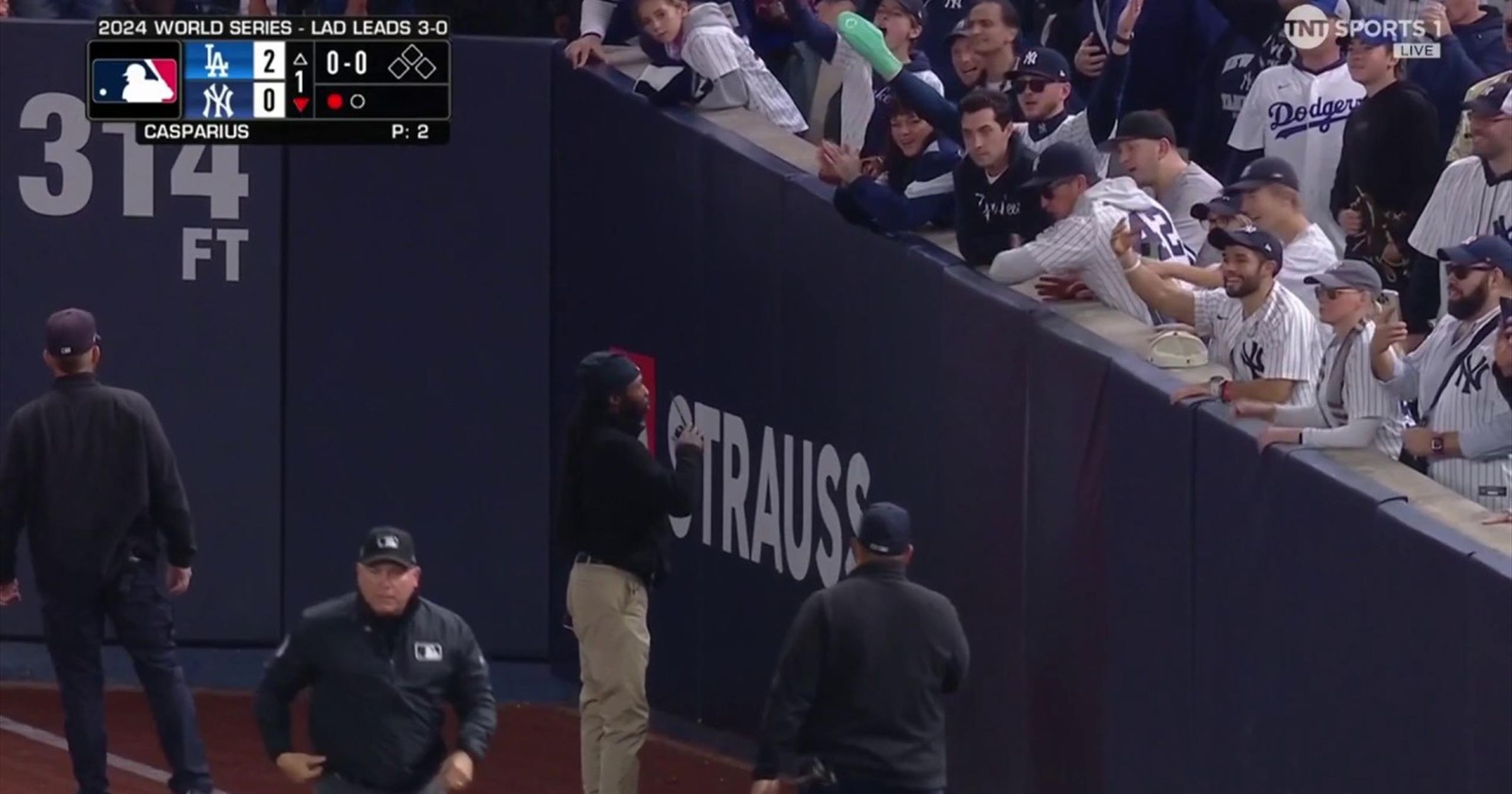 'He's wrestling with the fan!' - Watch INCREDIBLE fan interference ...