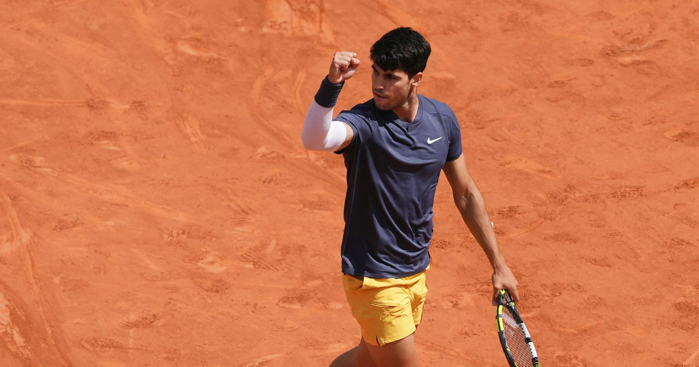 Carlos Alcaraz has his 'arms aloft' as he lights up the French Open ...