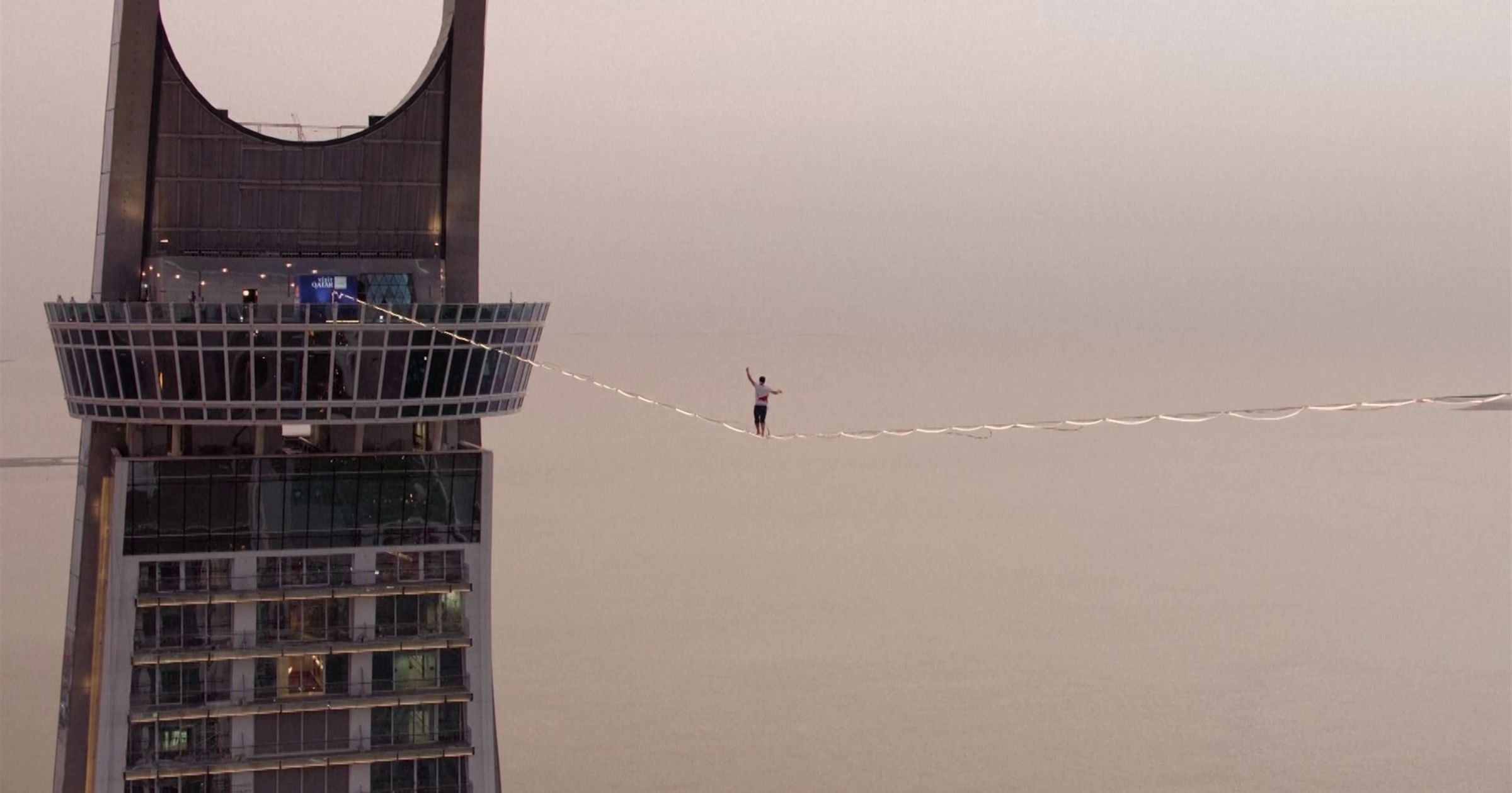 Don't look down! Record set for world’s longest LED slackline walk ...