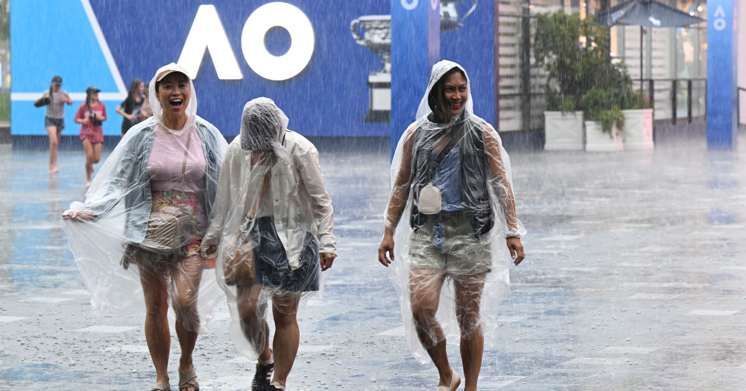 Australian Open photos - Day 1 badly disrupted as torrential rain ...
