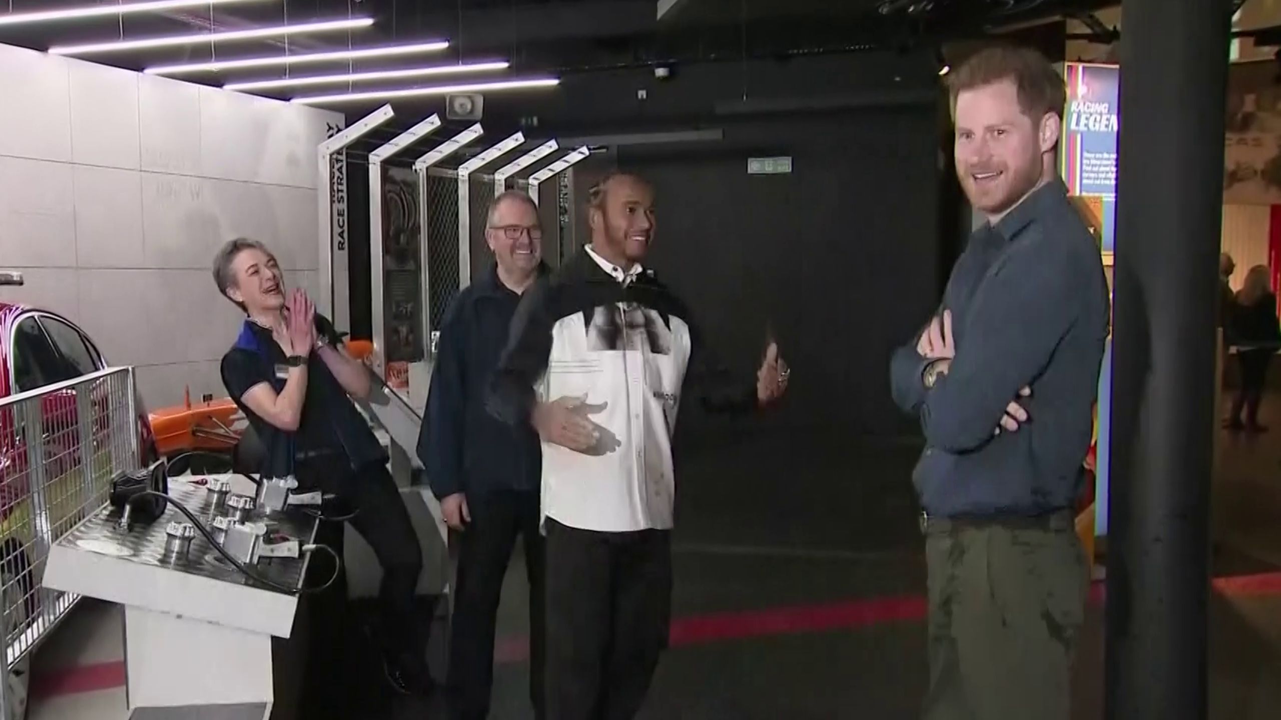 F1 video - Prince Harry beats Lewis Hamilton in pit-stop simulator at ...