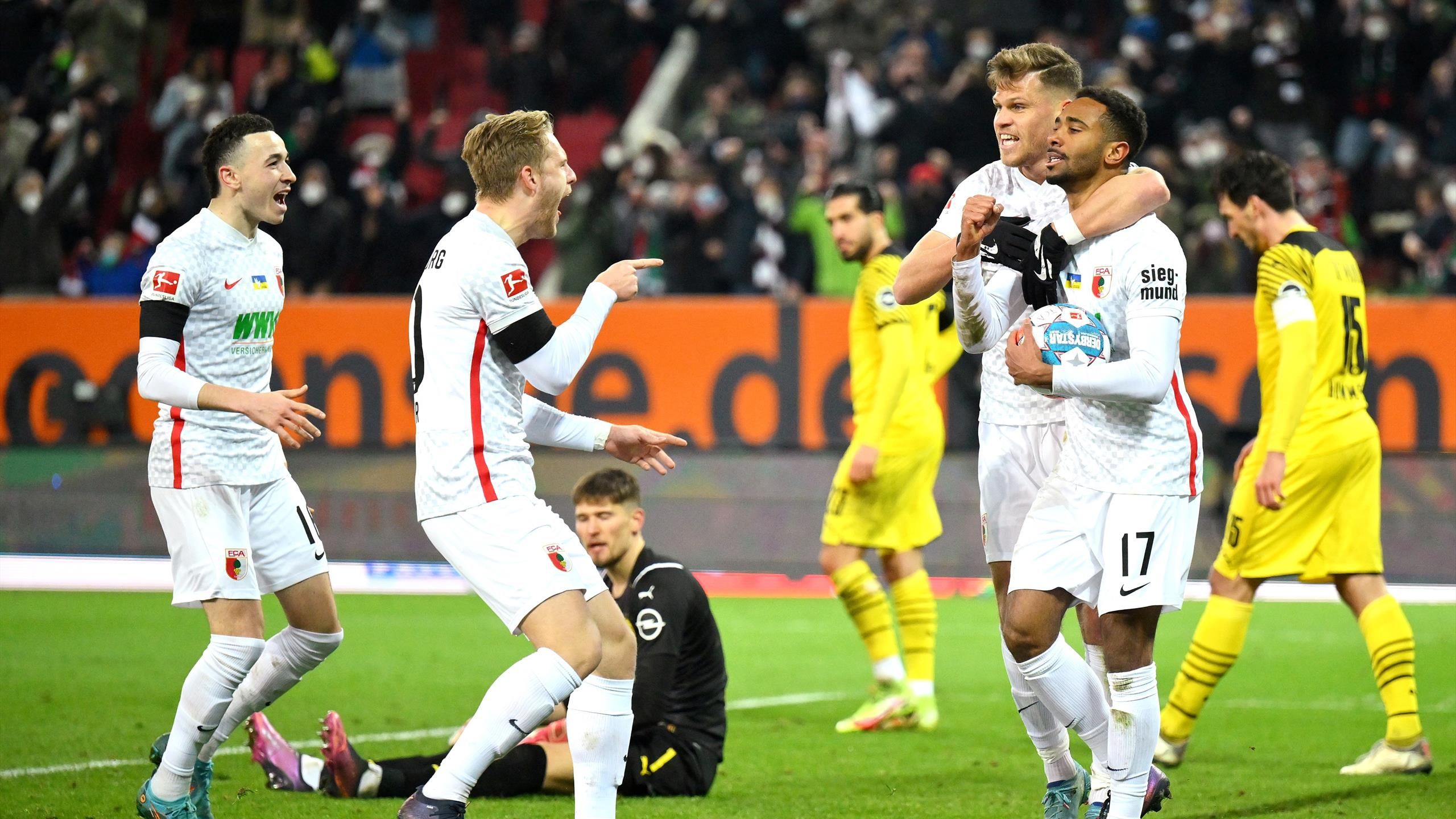 Borussia Dortmund held by Augsburg to lose ground on Bayern Munich ...
