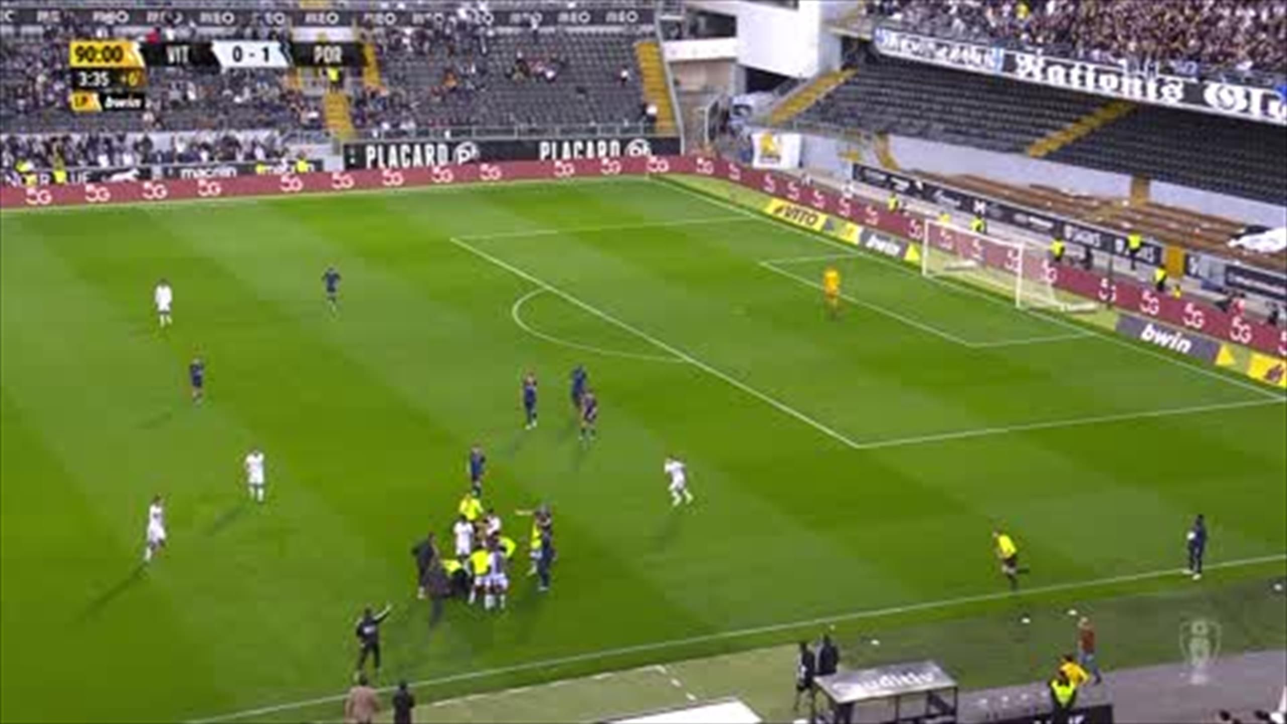 Shocking scene as pitch invader aims kick at Vitoria De Guimaraes ...