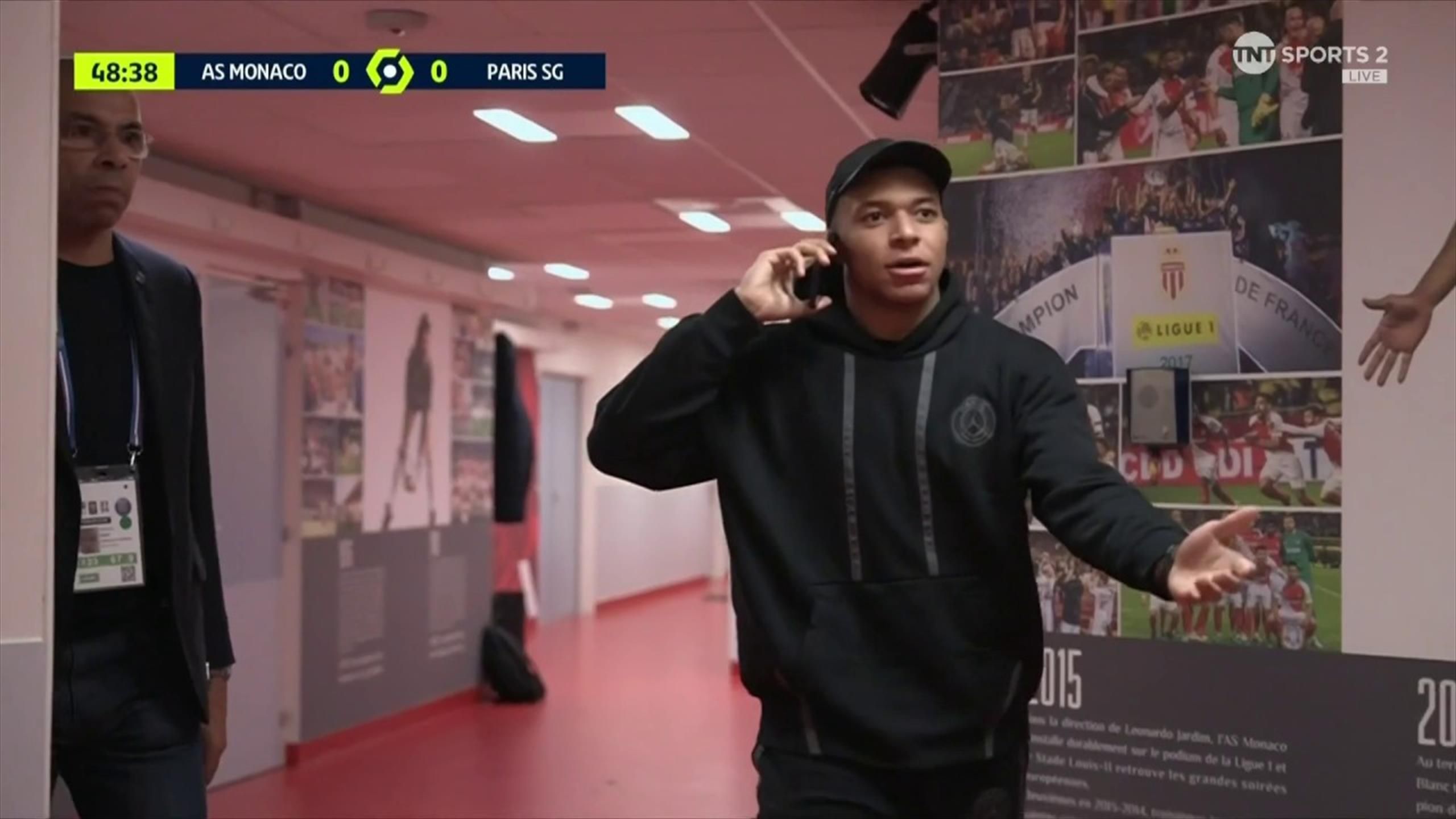 Kylian Mbappe takes phone call as subbed PSG star misses start of ...