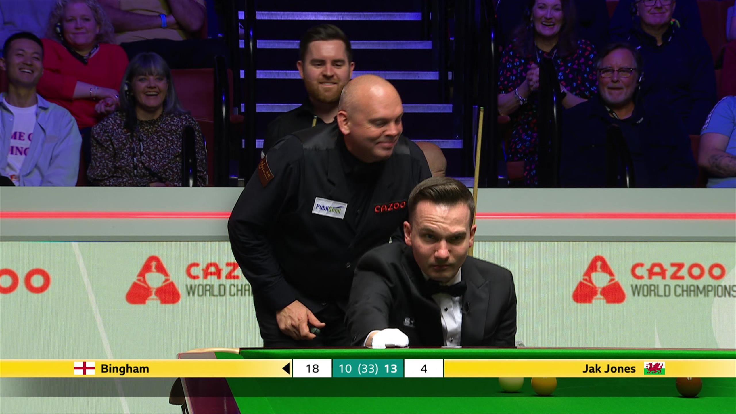 Referee Marcel Eckardt, Stuart Bingham and Jak Jones line up to check a ...