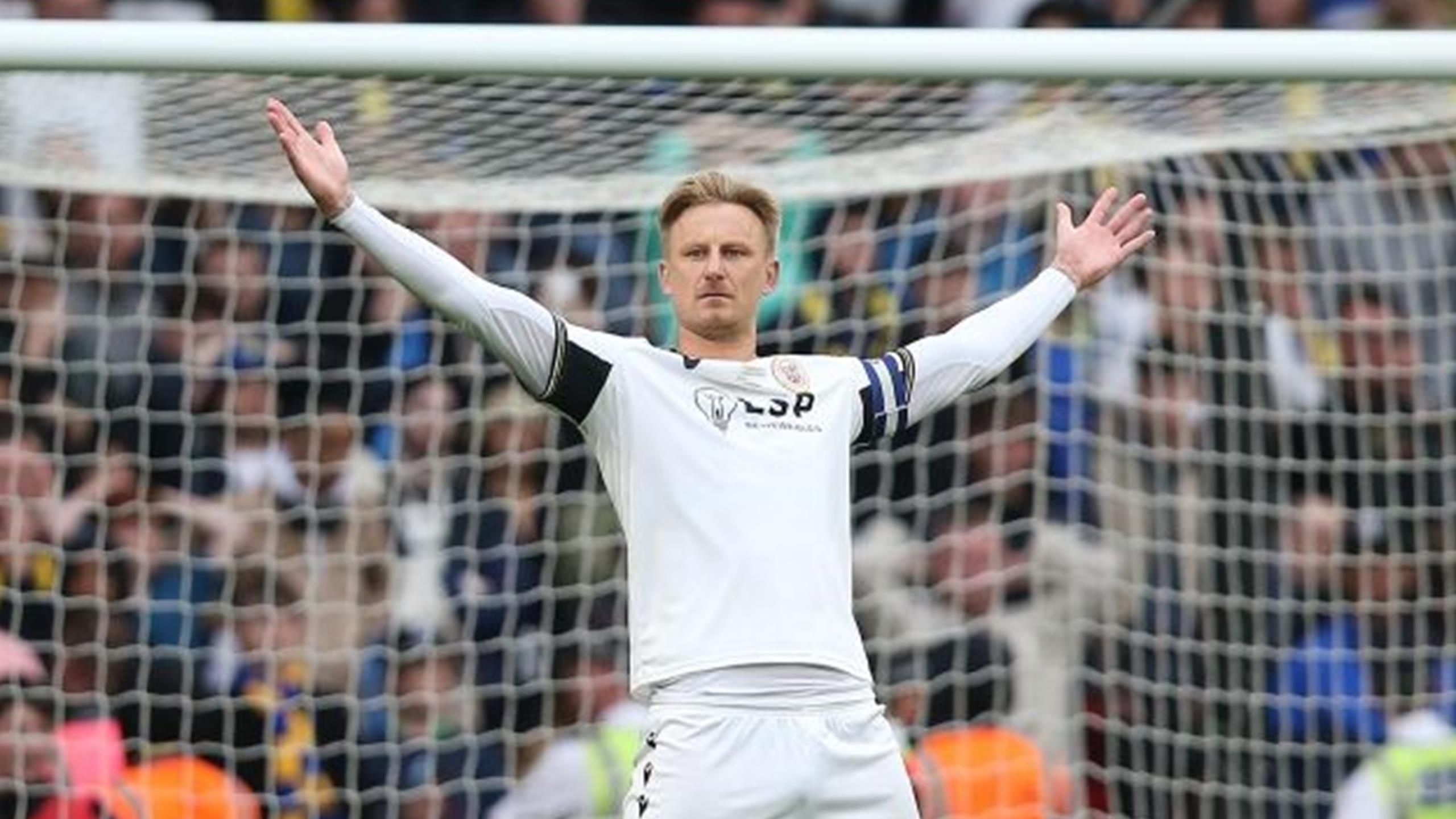 Bromley's Byron Webster wears the EFL captain's armband as he scores ...