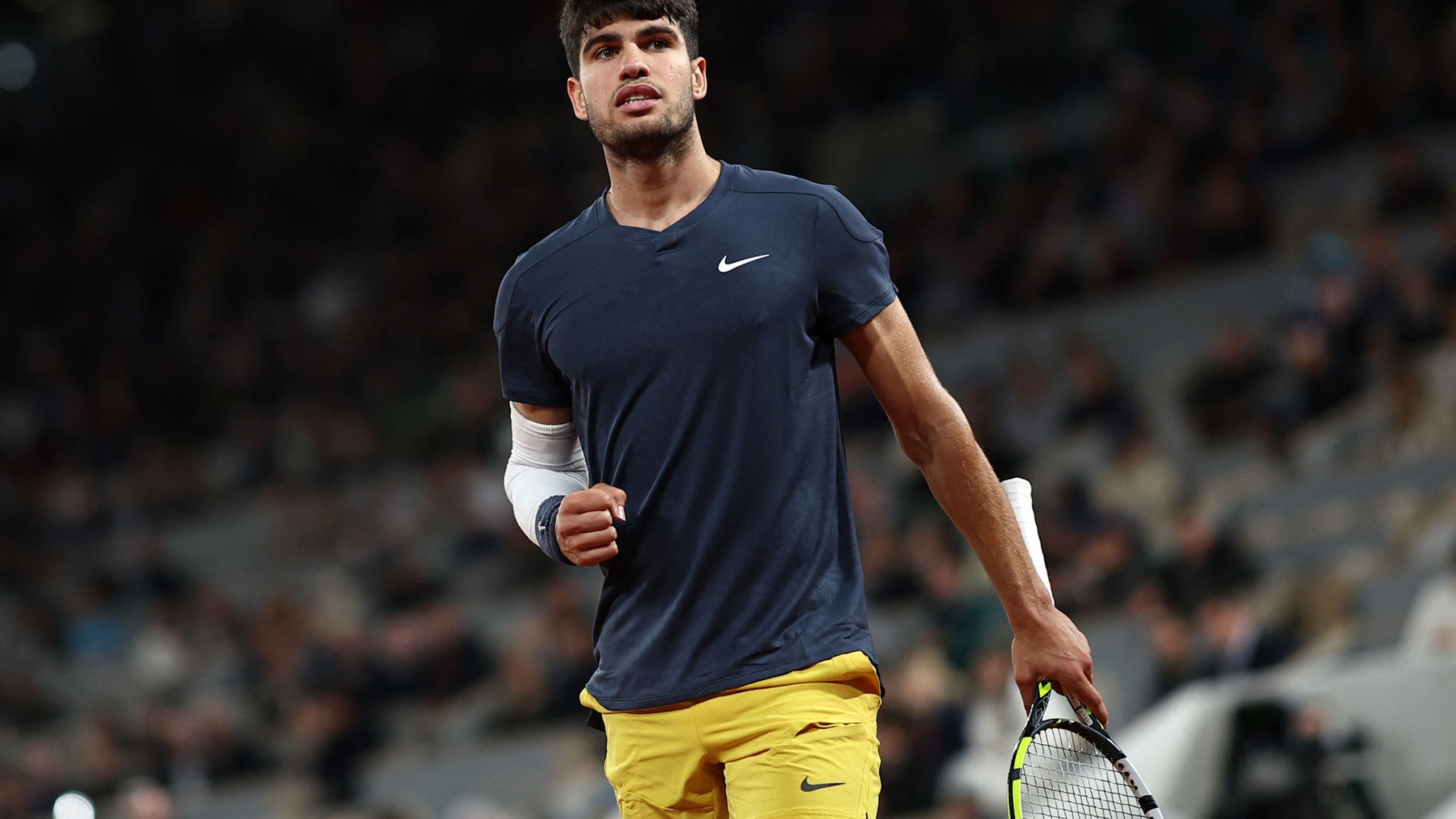 French Open: Carlos Alcaraz books spot in fourth round after thrilling ...