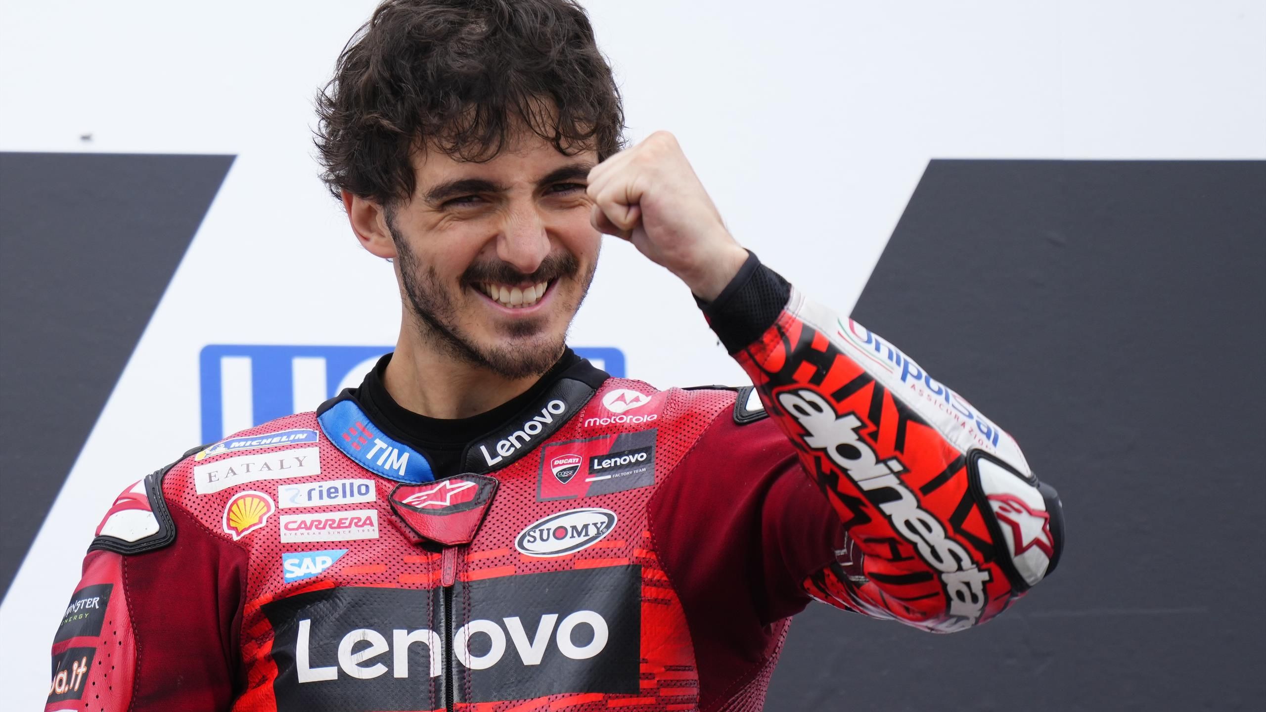 Keanu Reeves waves Francesco Bagnaia across finish line as Italian wins ...