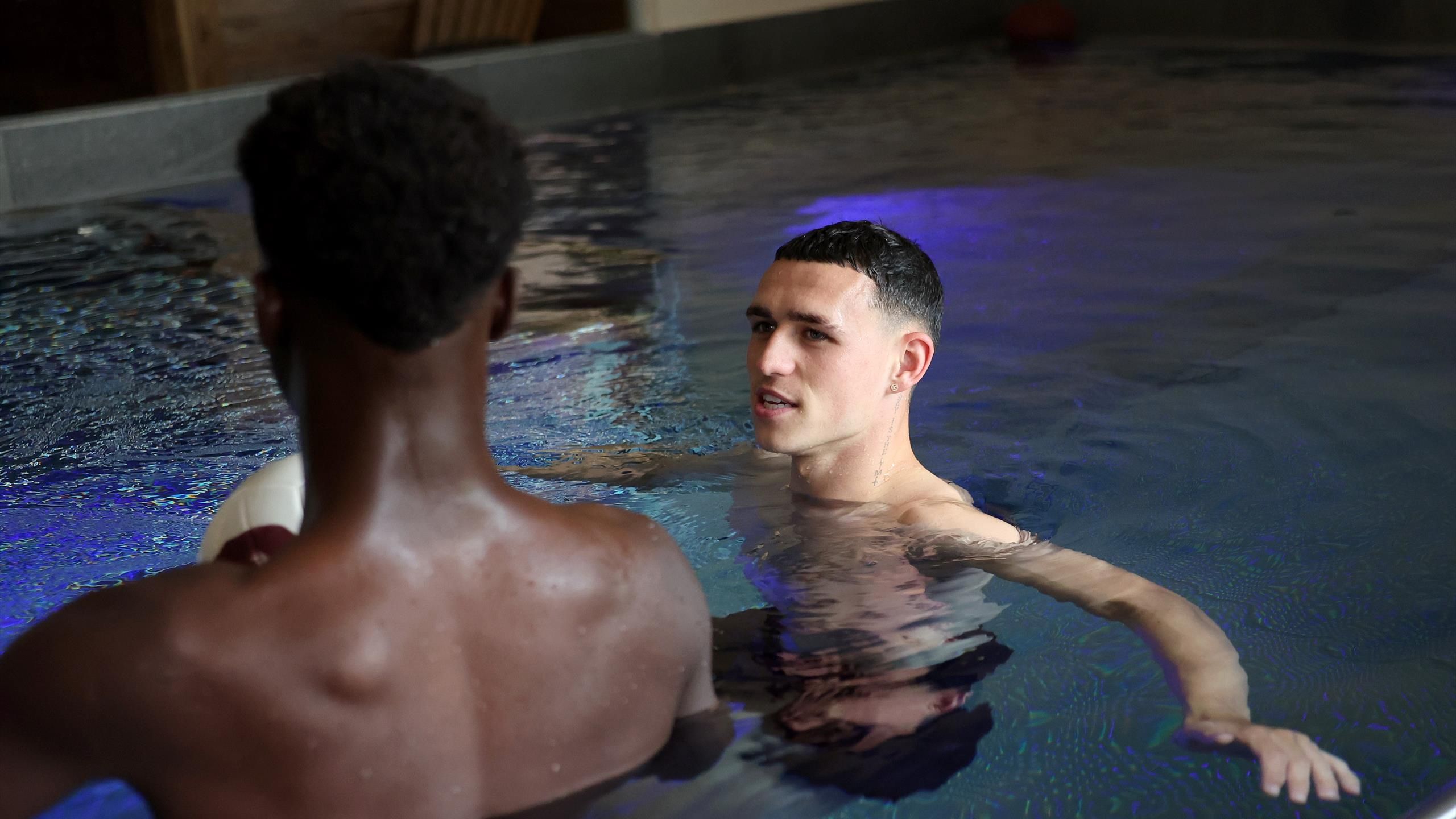 England players hit the pool after beating Netherlands and reaching ...