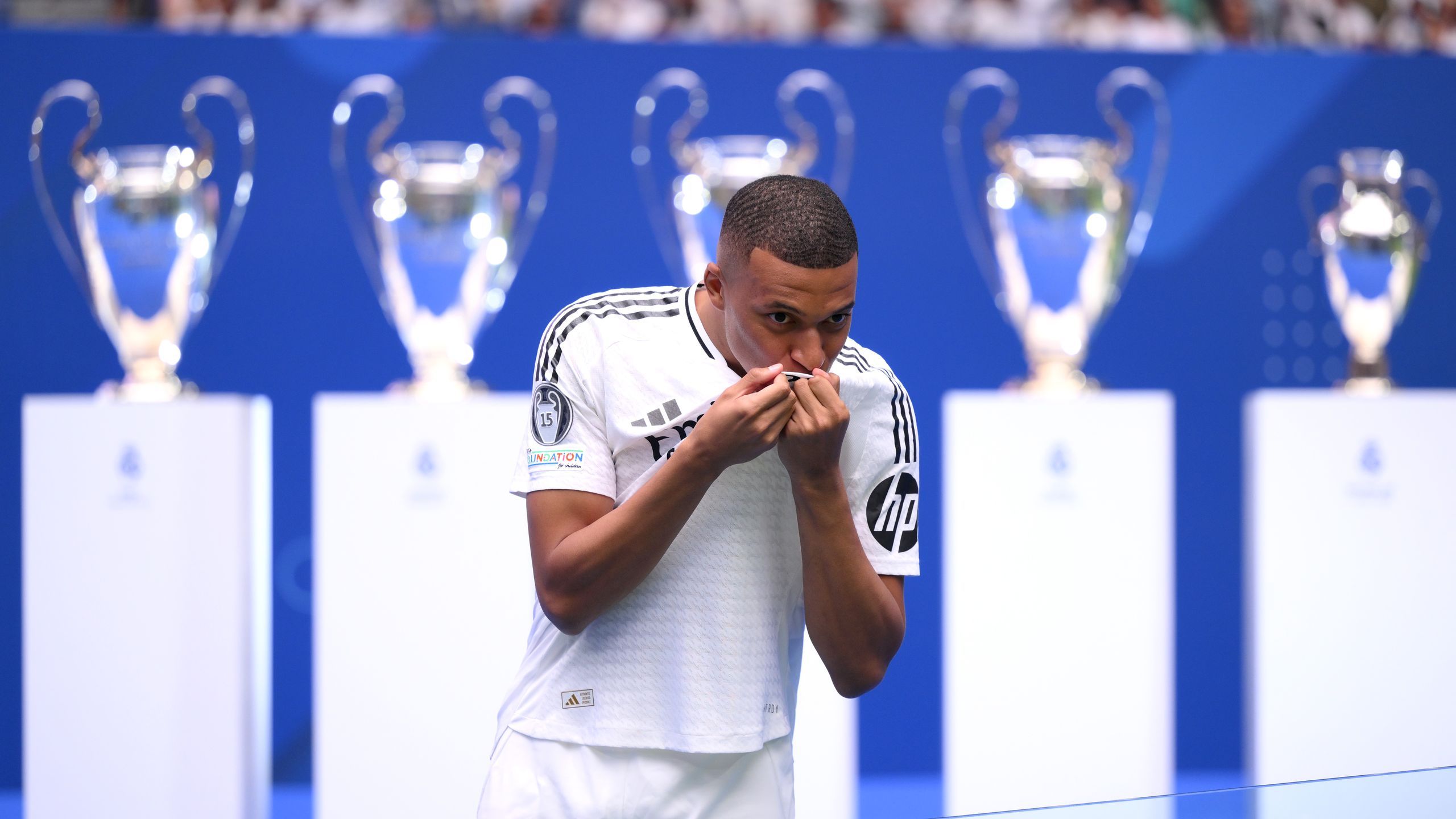 Kylian Mbappe embraces Santiago Bernabeu capacity crowd in official ...