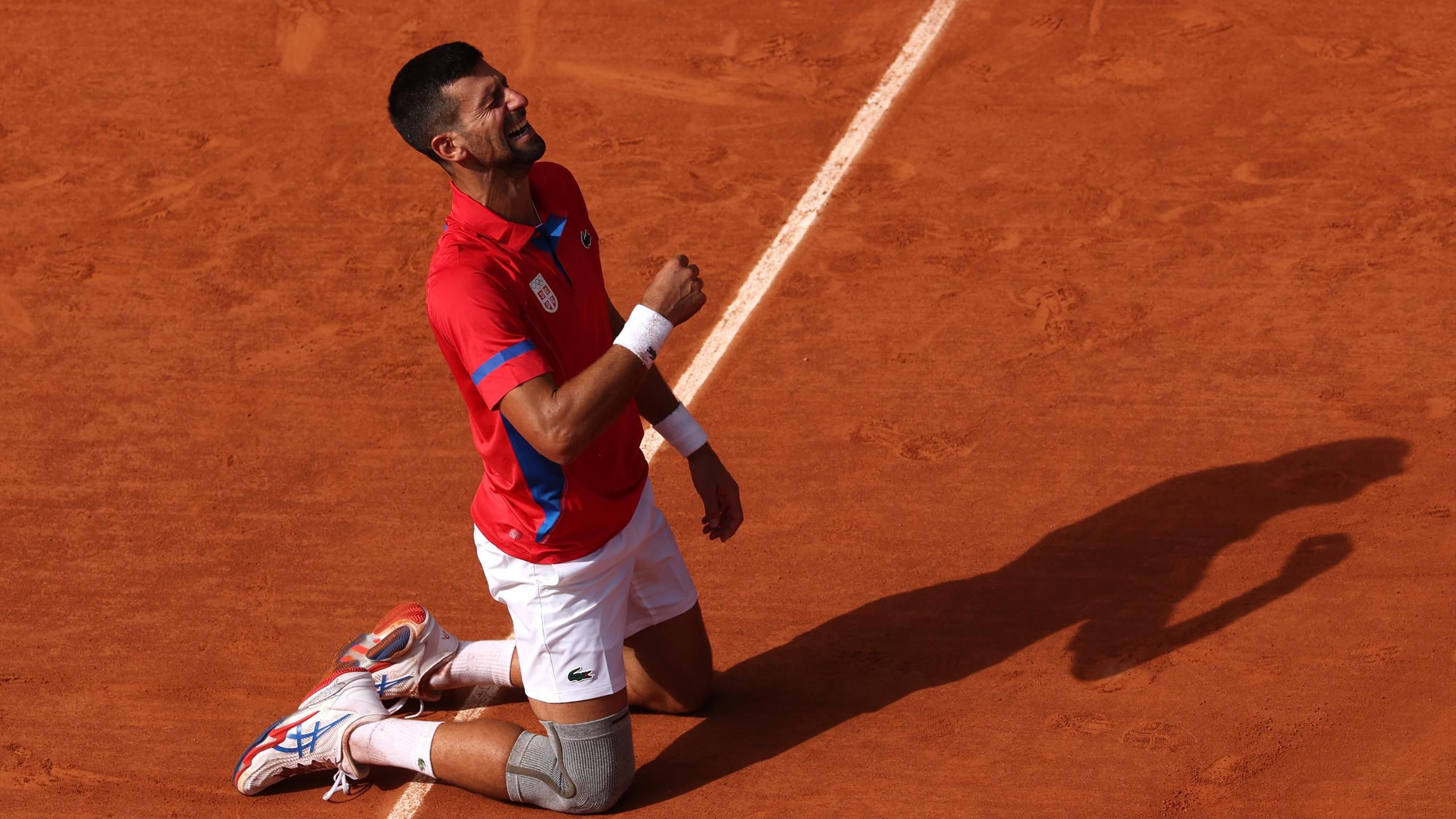 Watch emotional moment as ecstatic Novak Djokovic collapses to ground ...
