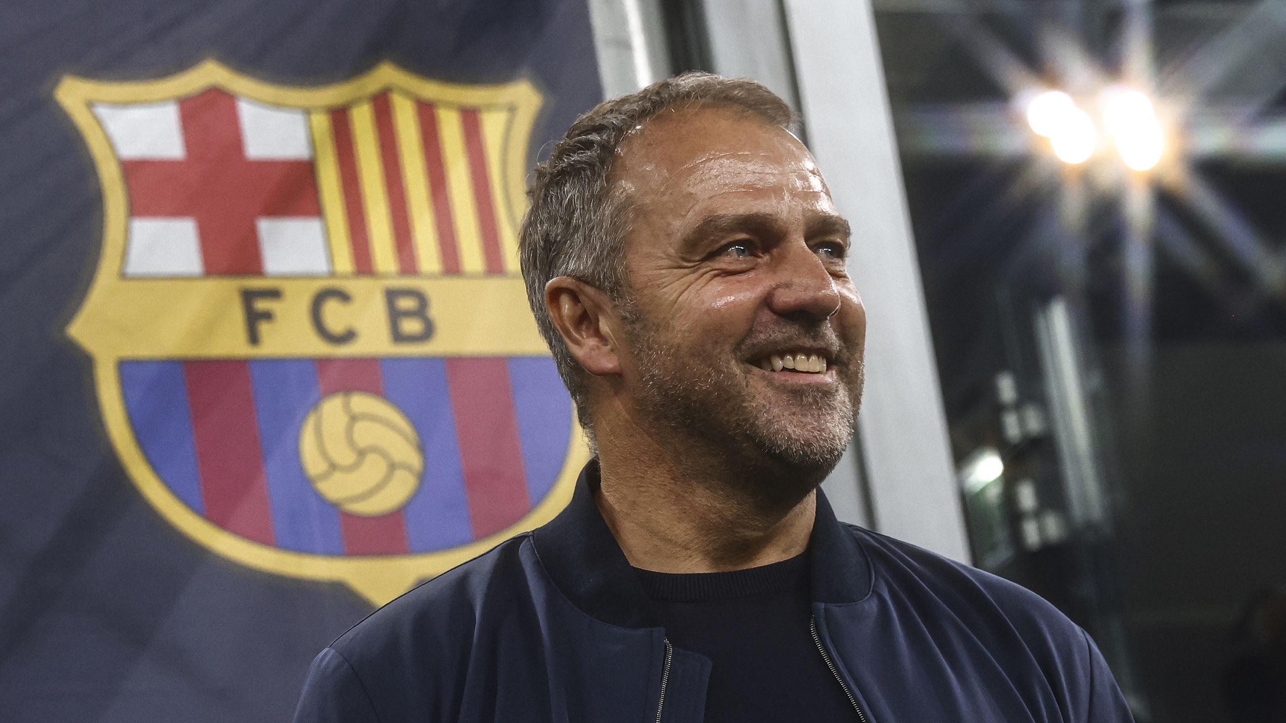Barcelona manager Hansi Flick signs contract extension until 2027 after ...