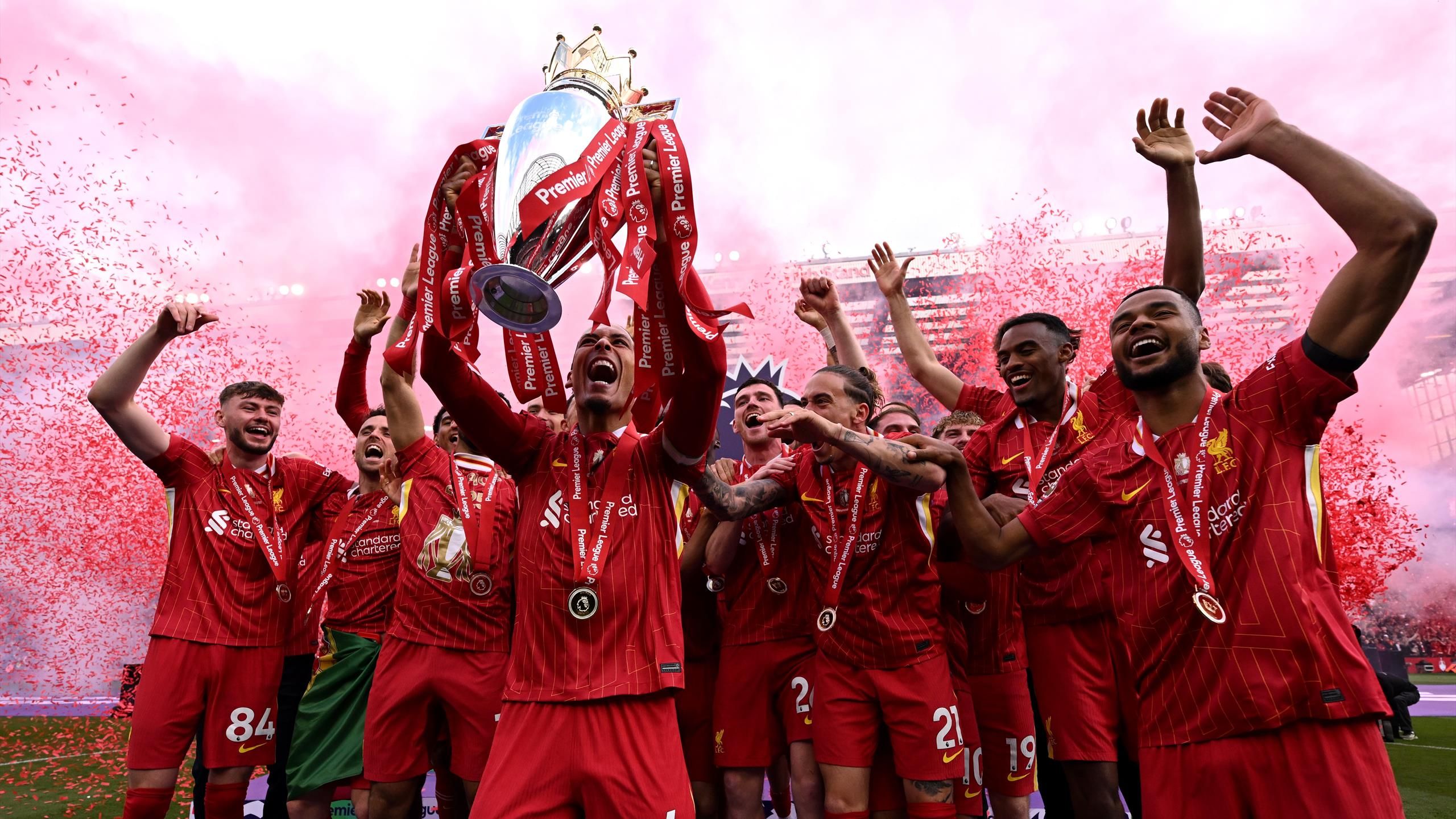 Virgil van Dijk lifts the Premier League trophy as Liverpool are ...