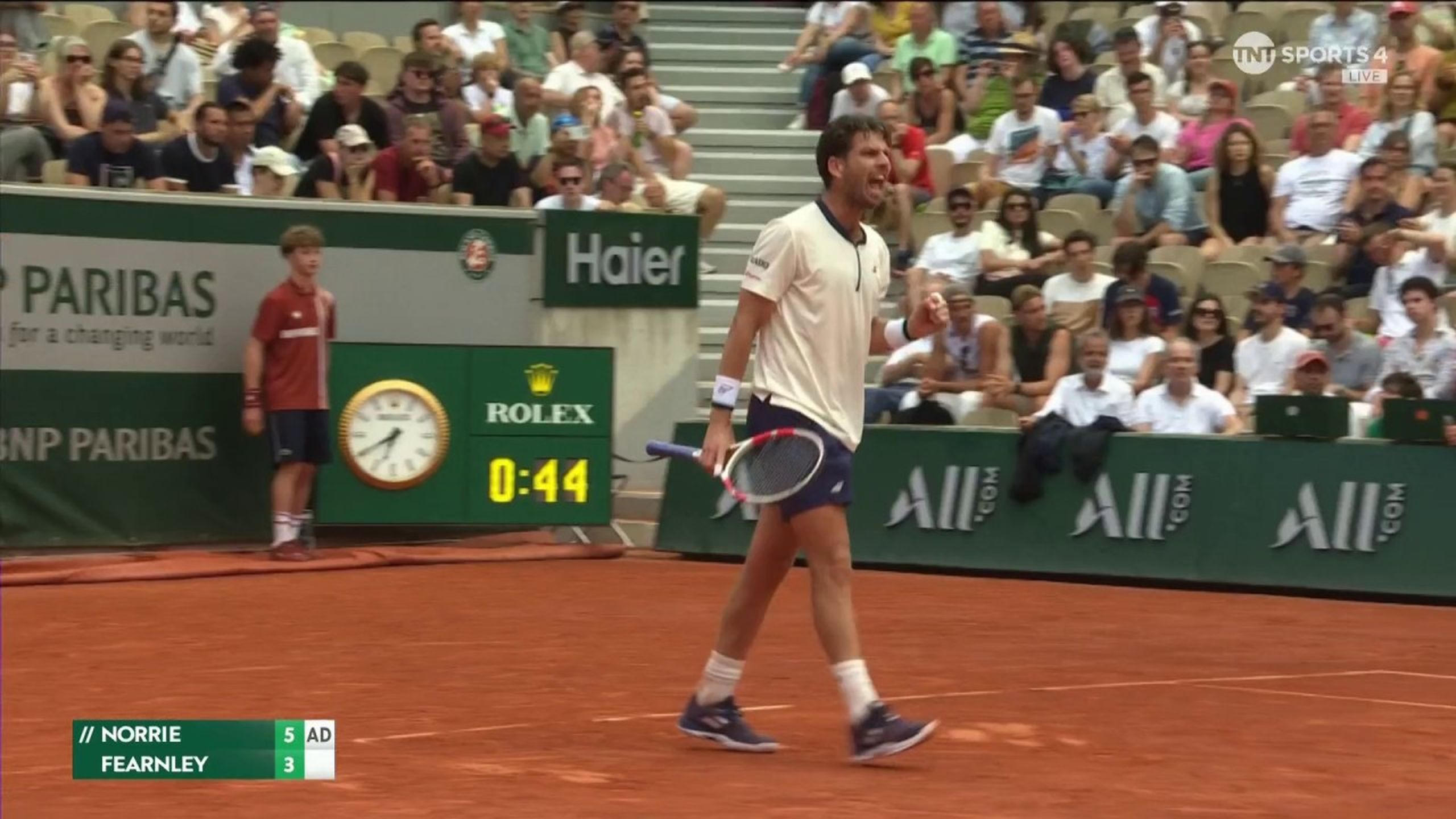 Watch as fired-up Cameron Norrie wins opening set against fellow Brit ...