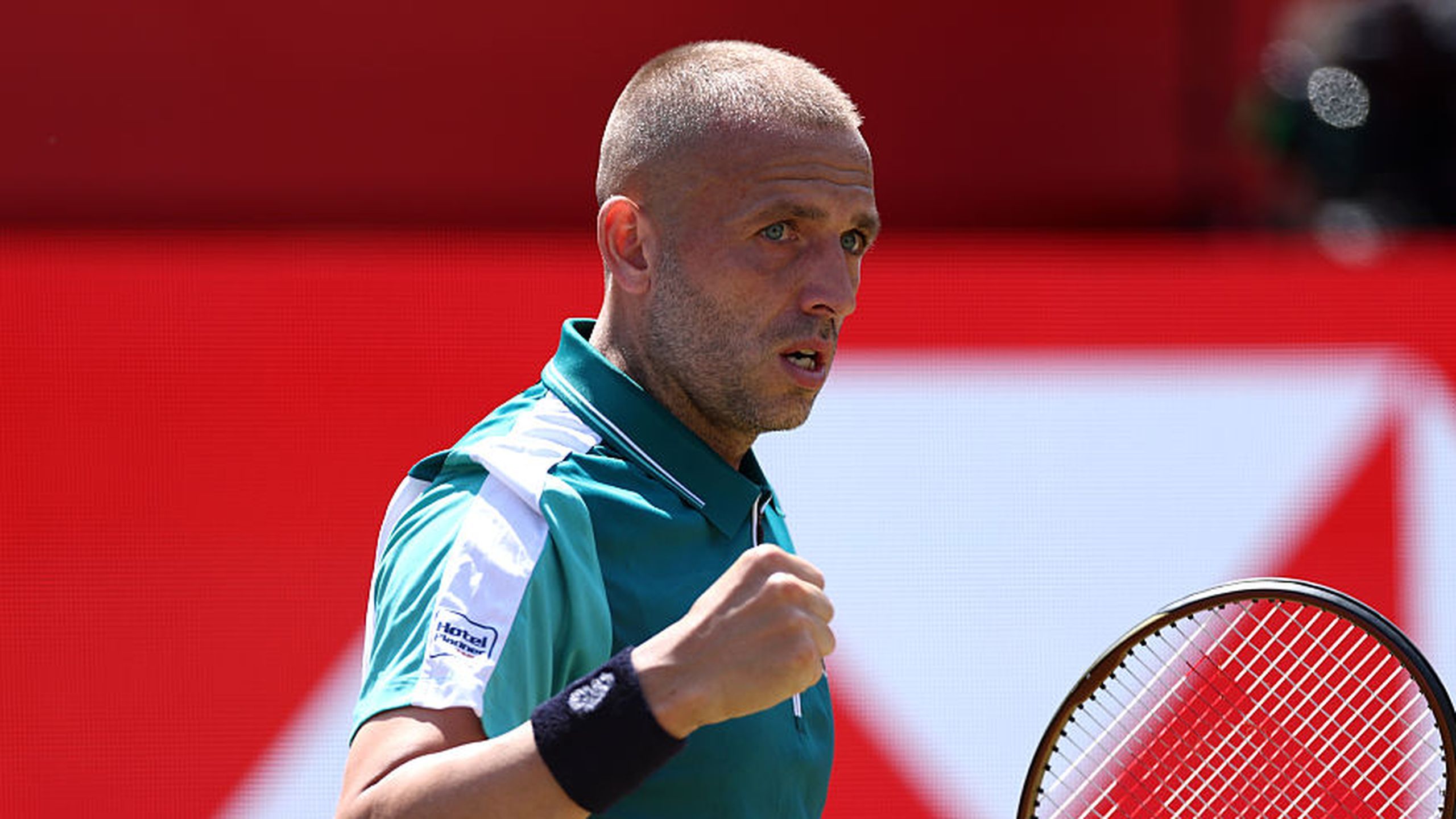 Dan Evans upsets seventh seed Frances Tiafoe on Andy Murray Arena at ...