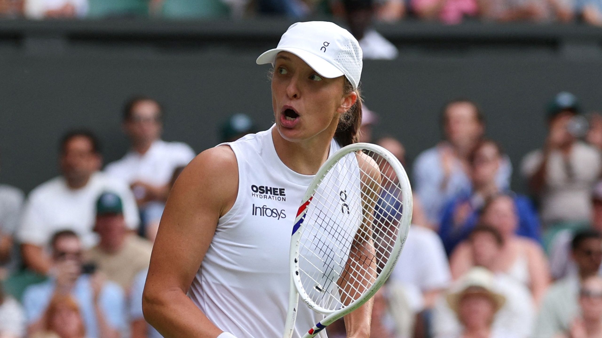 Iga Swiatek rallies for second-round victory over Caty McNally to avoid ...