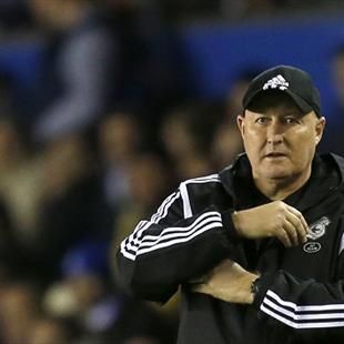 Joe Mason gives Russell Slade a lift, as Kenwyne Jones nears Cardiff ...