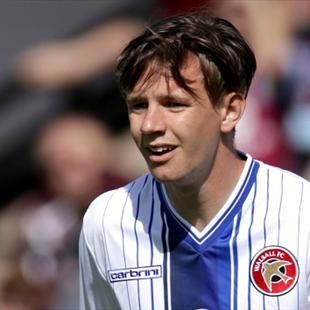 Micky Moore hails James Baxendale after debutant helps Mansfield past ...