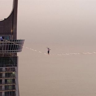 Don't look down! Record set for world’s longest LED slackline walk ...
