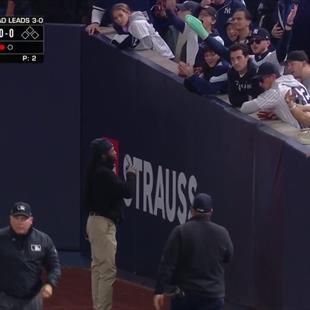 'He's wrestling with the fan!' - Watch INCREDIBLE fan interference ...