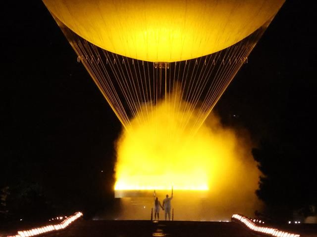 Olympic flame under magnificent balloon is lit as Paris 2024 Games ...