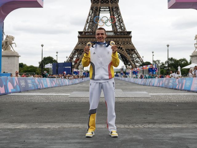 Remco Evenepoel survives late drama to become first man to ever do ...